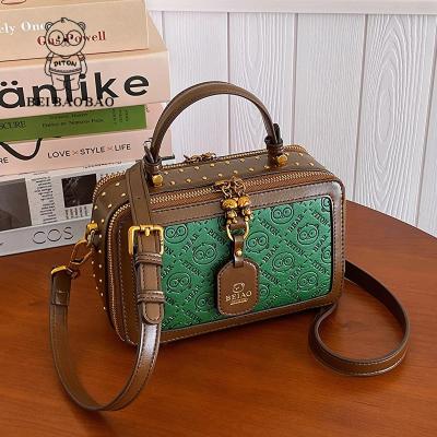 China PU Retro Embossed Small Square Bag With A Long Shoulder Strap For Handheld for sale