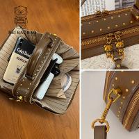 China PU Retro Embossed Small Square Bag With A Long Shoulder Strap For Handheld for sale