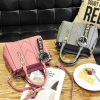 China Elegant Shoulder Purse in Genuine Leather with Cartoon Pattern and Button Decoration for sale