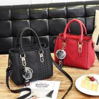 China Elegant Shoulder Purse in Genuine Leather with Cartoon Pattern and Button Decoration for sale
