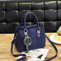China Elegant Shoulder Purse in Genuine Leather with Cartoon Pattern and Button Decoration for sale