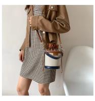 China Elegant Luxury Designer Bucket Bag For Ladies And Girls With Drawstring Leather And 2 Colors for sale