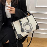 China 2024 Women's Single-Shoulder Canvas Handbag with Large Capacity Purse and Zip Closure for sale
