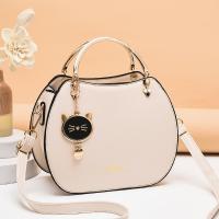 China Trendy Single Shoulder Women's Handbag with Cat Pendant and Zipper Closure for sale