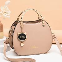 China Trendy Single Shoulder Women's Handbag with Cat Pendant and Zipper Closure for sale