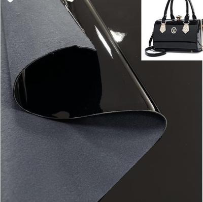 China Mirror Finish PU Synthetic Leather - 1.4m Width, 0.8mm Thickness for Footwear and Fashion Accessories for sale