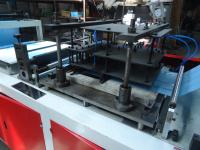 China Computerized Plastic Pe Apron Making Machine for 1200mm Bag Length at Competitive for sale