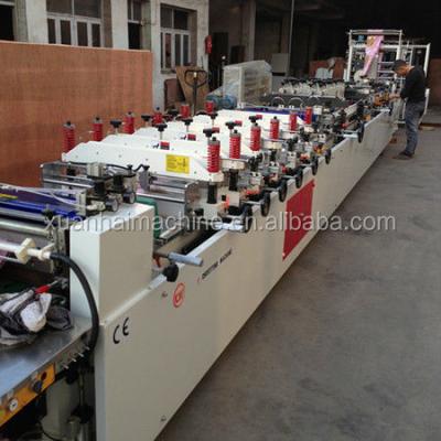 China Supermarket Food Packing Three Side Sealing Zipper Bag Making Machine at 220V Voltage for sale