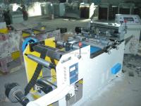 China shrink perforation pvc sleeve cutting machine for all kinds of bottles,cans,cups for sale