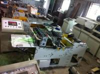 China shrink perforation pvc sleeve cutting machine for all kinds of bottles,cans,cups for sale