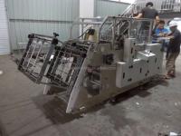 China Xuanhai Automatic Fast Food Box Making Machine for Hamburger Lunch Carton Box Paper Box Forming Machine 100-450mm Max 1.5mm for sale