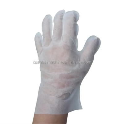 China Full Automatic Disposable non woven glove making machine for sale