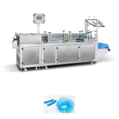 China Video Outgoing-Inspection Provided Non-Woven Bouffant Clip Strip Cap Making Machine for sale