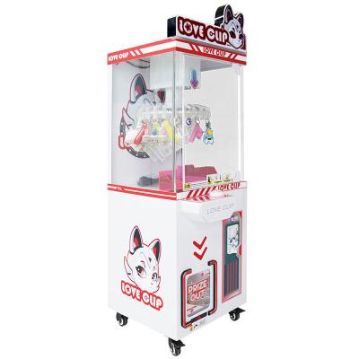 China Red Coin Operated Clip Machine Game for sale