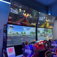 China Dual Player 4-Screen Racing Arcade Simulator Machine High-End Car Driving Game Machine for sale