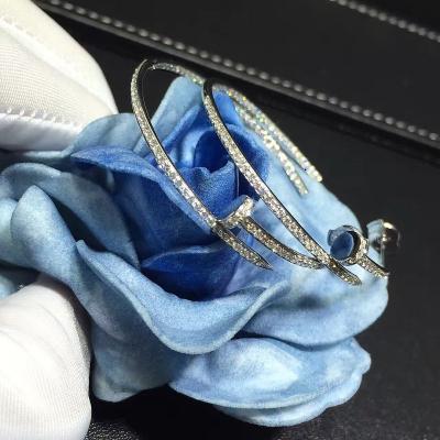 China No Gemstone Juste Un Clou Earrings Nail Shape 18K White Gold With Diamonds for sale