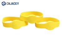 China Water Proof TK4100 Yellow RFID Silicone Wristband , Writable Wristbands for sale