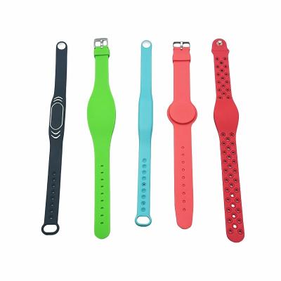 China Embossed Silicone RFID Wristband NFC Contactless Gym Band for Men 26mm for sale