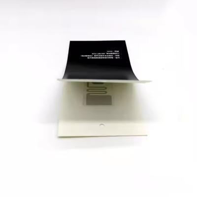 China Custom Printing UHF RFID Paper Hang Tag for Apparel 860-960MHz for sale