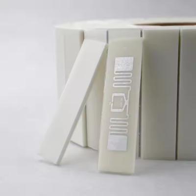 China 860-960MHz UHF Foam Backed Dogbone RFID Wet Inlay Tag for Race Timing System for sale