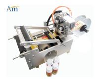 China Semi - Auto Round Bottle Sticker Labeling Machine Manual Adhesive Labels Bottles for sale