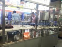 China Low Noise Rotary Bottle Filling And Capping Machine Liquid Production Line for sale