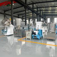 China floating fish feed extruder machine designed for producing sinking and simple floating fish feed pellets using twin screw extrusion technology for sale