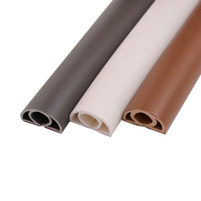 China STRONG & SOFT ADHESIVE Keeps the Product Firmly Silicone Electrical Floor Carpet Cable Wrap Sleeve Wire Cord Hider Cover for sale