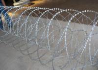 China OD 900mm Concertina Razor Barbed Wire Coiled BTO 22  Galvanized for sale