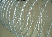 China Hot Dipped Galvanized Razor Blade Fencing Wire Barbed 65mm Length CBT 65 for sale