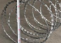 China Hot Dipped Galvanized Razor Blade Fencing Wire Barbed 65mm Length CBT 65 for sale