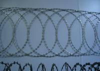 China Electro Galvanized Razor Barbed Wire BTO 22 700MM Coil for sale