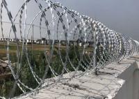 China Electro Galvanized Razor Barbed Wire BTO 22 700MM Coil for sale