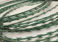 China PVC Coated Razor Barbed Wire 450MM Coil BTO 22 0.5mm thickness for sale