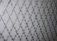 China Coil Barbed Welded Razor Wire Mesh BTO 22 10mm Length For Highway for sale