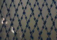 China 75x150mm Concertina Diamond Mesh Razor Wire Fencing BTO 25 SS316 for sale
