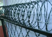 China 75x150mm Concertina Diamond Mesh Razor Wire Fencing BTO 25 SS316 for sale