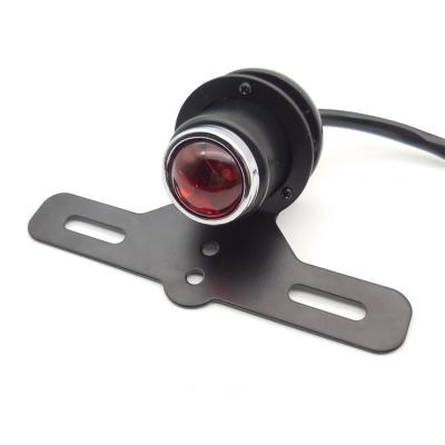 China Sample Custom 12V Motorcycle Stop Brake Tail Light Lamp in Black for sale