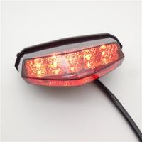 China 12V Black LED Driving Brake Tail Light for Motorcycle ABS AS Material Emark Certified for sale