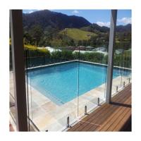China Zambia frameless glass balustrade spigots railing tempered spigot glass pool fence panels for sale