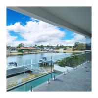 China Toughened glass panels for decking glass balustrade staircase cost 2205 stainless steel spigots railing for sale