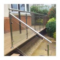 China Low iron glass banister black rod iron porch railing prices for sale