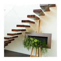 China Indoor wood floating staircase wood tread steel handrail staircase arc floating stairs for sale