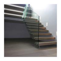 China Villa wood floating stairs factory customized black teak wood tread floating stair design for sale