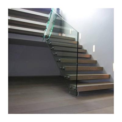 China Villa wood floating stairs factory customized black teak wood tread floating stair design for sale