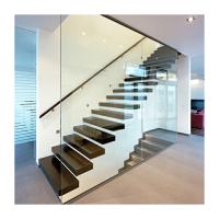 China Villa wood floating stairs factory customized black teak wood tread floating stair design for sale