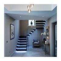 China Oak veneer floating staircase curved wooden staircase black floating stairs for sale