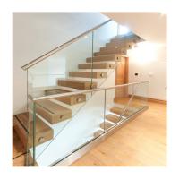 China Oak veneer floating staircase curved wooden staircase black floating stairs for sale