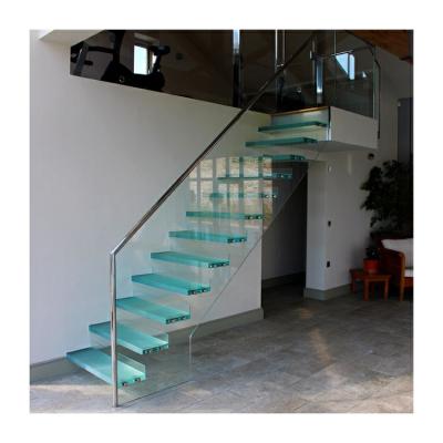 China Invisible stringer stairs laminated safety glass floating staircases for sale