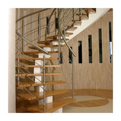 China Timber wooden steps steel round staircase design Dominican Republic beautiful curved stairway for sale